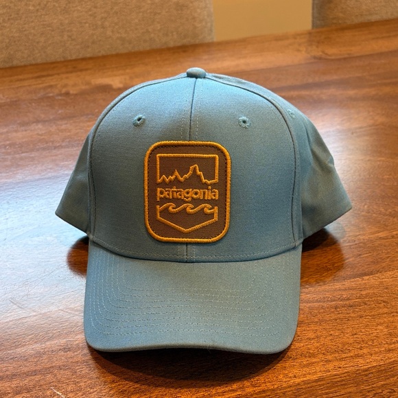 Patagonia | Accessories | Patagonia Baby Blue Cap With Tan Logo | Poshmark